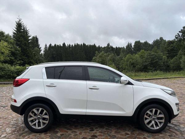 Yellow Kia Sportage 2014 in Telschi, with an engine capacity of 1.59 L and mileage of 202 thousand km for 7250 €, photo 2 on AUTOMOTO.COM.LV