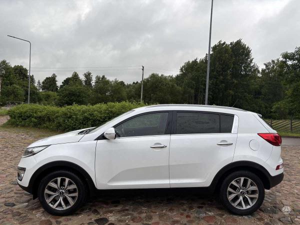 Yellow Kia Sportage 2014 in Telschi, with an engine capacity of 1.59 L and mileage of 202 thousand km for 7250 €, photo 5 on AUTOMOTO.COM.LV