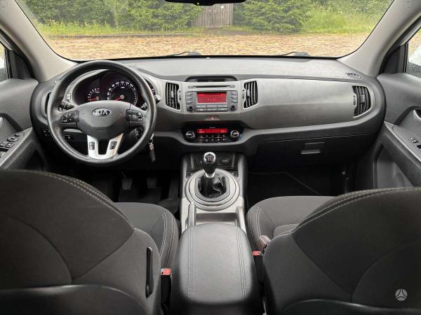 Yellow Kia Sportage 2014 in Telschi, with an engine capacity of 1.59 L and mileage of 202 thousand km for 7250 €, photo 8 on AUTOMOTO.COM.LV