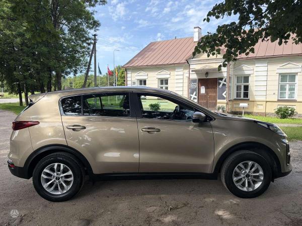 Yellow Kia Sportage 2019 in Utena, with an engine capacity of 1.60 L and mileage of 187 thousand km for 11800 €, photo 4 on AUTOMOTO.COM.LV