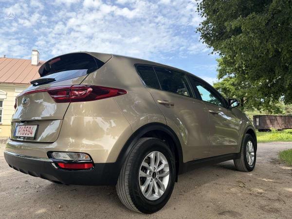 Yellow Kia Sportage 2019 in Utena, with an engine capacity of 1.60 L and mileage of 187 thousand km for 11800 €, photo 5 on AUTOMOTO.COM.LV