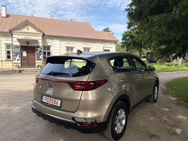 Yellow Kia Sportage 2019 in Utena, with an engine capacity of 1.60 L and mileage of 187 thousand km for 11800 €, photo 6 on AUTOMOTO.COM.LV
