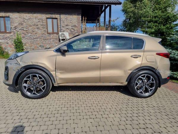 Yellow Kia Sportage 2020 in Alytus, with an engine capacity of 1.60 L and mileage of 161 thousand km for 9900 €, photo 6 on AUTOMOTO.COM.LV