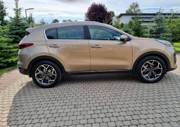 Yellow Kia Sportage 2020 in Alytus, with an engine capacity of 1.60 L and mileage of 161 thousand km for 9900 €, photo 8 on AUTOMOTO.COM.LV