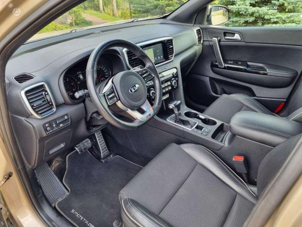 Yellow Kia Sportage 2020 in Alytus, with an engine capacity of 1.60 L and mileage of 161 thousand km for 9900 €, photo 11 on AUTOMOTO.COM.LV