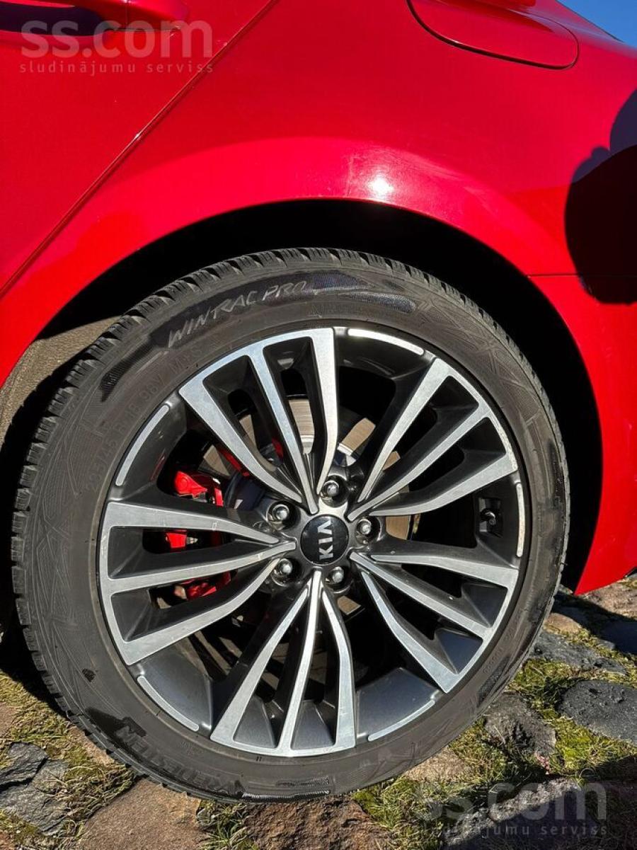 Red Kia Stinger 2018 in Liepaja, with an engine capacity of 2.20 L and mileage of 140 thousand km for 17300 €, photo 6 on AUTOMOTO.COM.LV