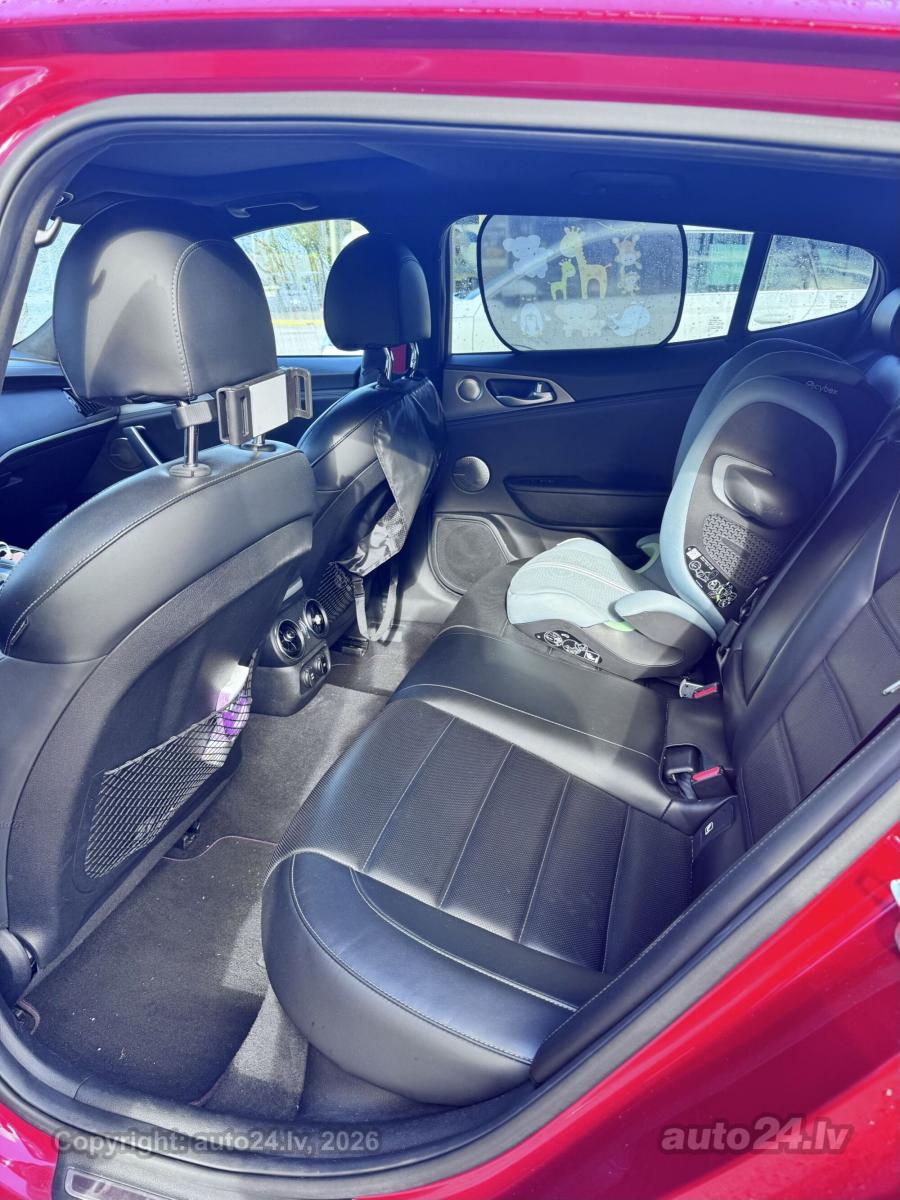 Red Kia Stinger 2020 in Tallinn, with an engine capacity of 3.30 L and mileage of 97 thousand km for 28900 €, photo 6 on AUTOMOTO.COM.LV