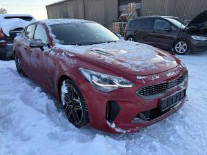 Red Kia Stinger 2023 in Riga, with an engine capacity of 3.34 L and mileage of 12 thousand km for 24426 €, photo 2 on AUTOMOTO.COM.LV