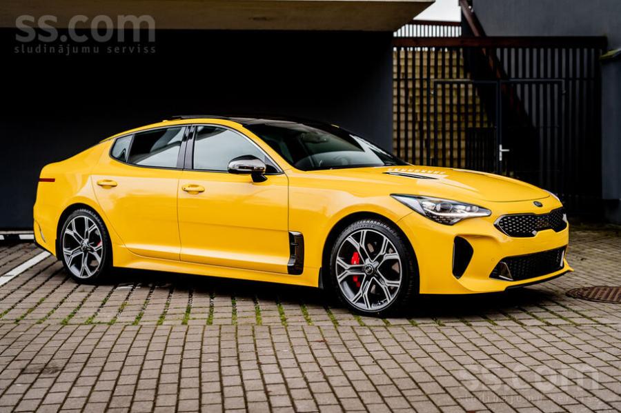 Yellow Kia Stinger 2018 in Tallinn, with an engine capacity of 3.30 L and mileage of 93 thousand km for 24999 €, photo 1 on AUTOMOTO.COM.LV
