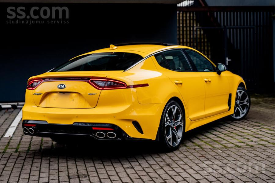 Yellow Kia Stinger 2018 in Tallinn, with an engine capacity of 3.30 L and mileage of 93 thousand km for 24999 €, photo 12 on AUTOMOTO.COM.LV