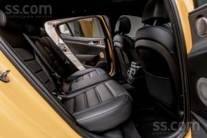 Yellow Kia Stinger 2018 in Tallinn, with an engine capacity of 3.30 L and mileage of 93 thousand km for 24999 €, photo 16 on AUTOMOTO.COM.LV