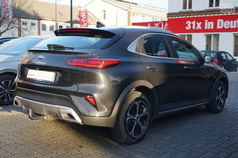 Black Kia XCeed 2022 in Kaunas, with an engine capacity of 1.60 L and mileage of 89 thousand km for 24450 €, photo 6 on AUTOMOTO.COM.LV
