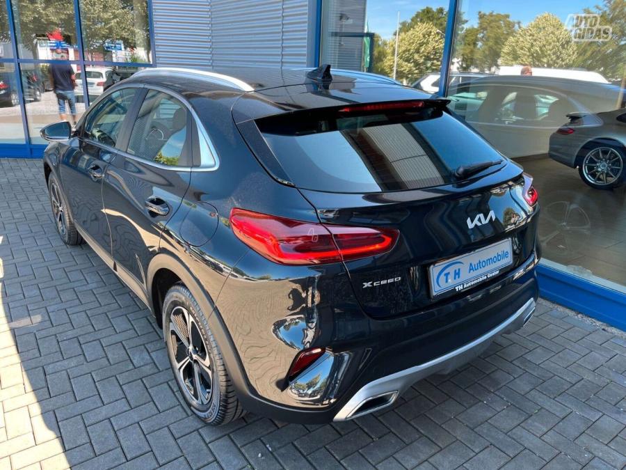 Black Kia XCeed 2022 in Kaunas, with an engine capacity of 1.60 L and mileage of 55 thousand km for 21834 €, photo 6 on AUTOMOTO.COM.LV