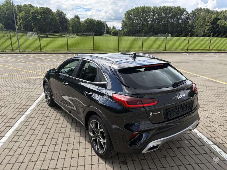 Black Kia XCeed 2022 in Marijampole, with an engine capacity of 1.58 L and mileage of 93 thousand km for 17600 €, photo 8 on AUTOMOTO.COM.LV