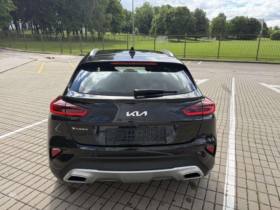 Black Kia XCeed 2022 in Marijampole, with an engine capacity of 1.58 L and mileage of 93 thousand km for 17600 €, photo 10 on AUTOMOTO.COM.LV