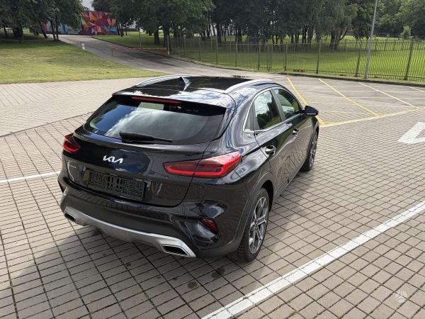 Black Kia XCeed 2022 in Marijampole, with an engine capacity of 1.58 L and mileage of 93 thousand km for 17600 €, photo 10 on AUTOMOTO.COM.LV