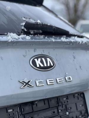 Grey Kia XCeed 2019 in Klaipeda, with an engine capacity of 1.60 L and mileage of 223 thousand km for 11111 €, photo 3 on AUTOMOTO.COM.LV