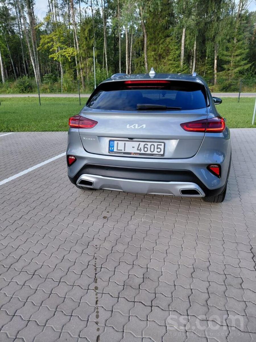 Grey Kia XCeed 2021 in Riga, with an engine capacity of 1.50 L and mileage of 141 thousand km for 13900 €, photo 5 on AUTOMOTO.COM.LV