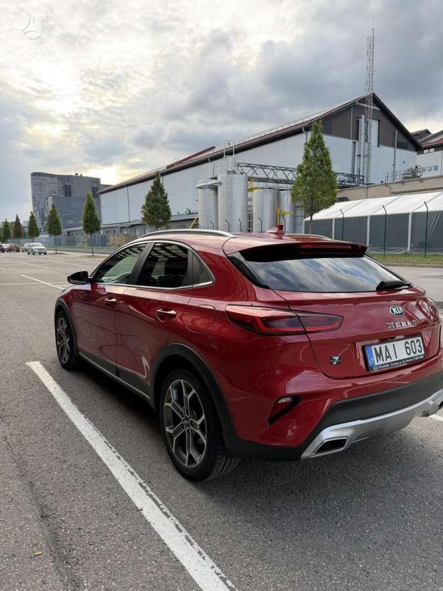 Red Kia XCeed 2021 in Kaunas, with an engine capacity of 1.48 L and mileage of 64 thousand km for 19500 €, photo 6 on AUTOMOTO.COM.LV
