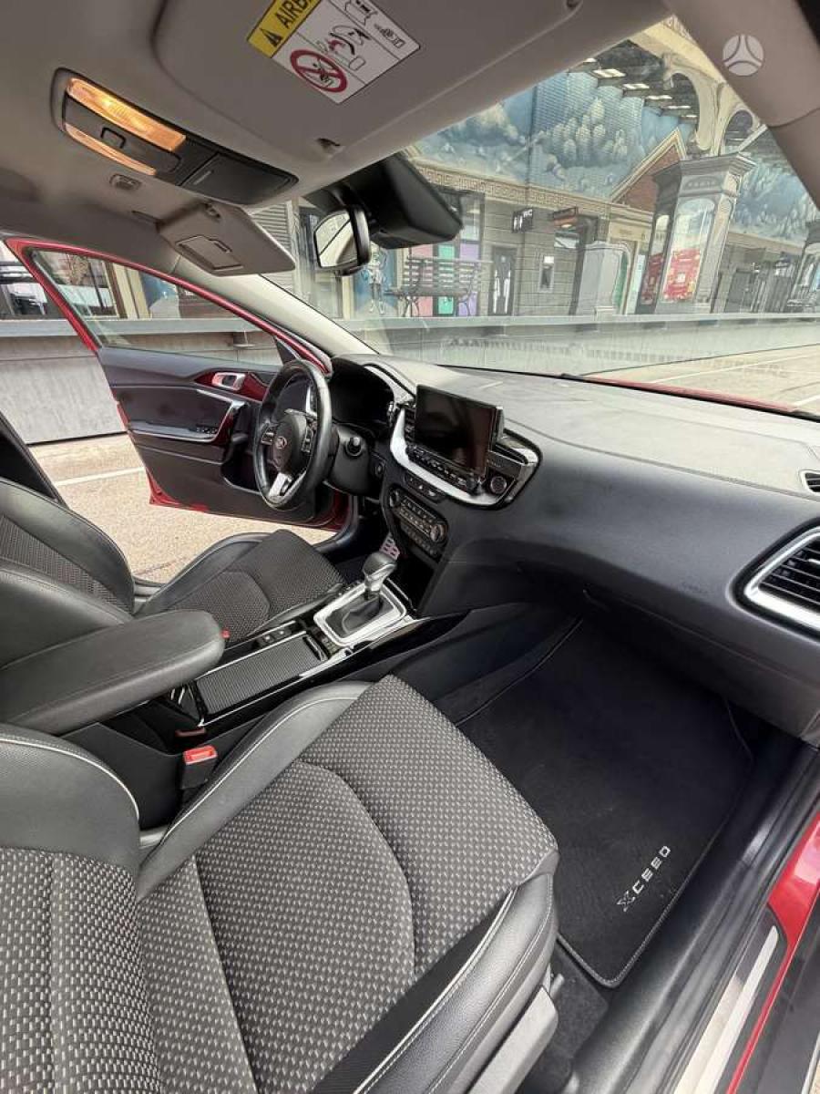 Red Kia XCeed 2021 in Kaunas, with an engine capacity of 1.48 L and mileage of 64 thousand km for 19500 €, photo 19 on AUTOMOTO.COM.LV