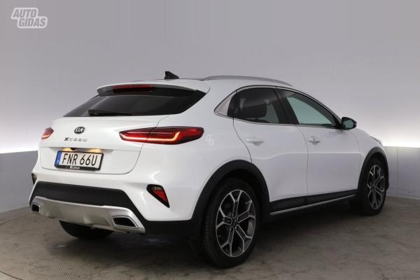 White Kia XCeed 2021 in Kaunas, with an engine capacity of 0.00 L and mileage of 56 thousand km for 24584 €, photo 5 on AUTOMOTO.COM.LV