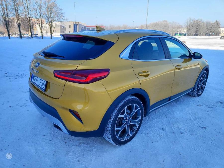 Yellow Kia XCeed 2019 in Kaunas, with an engine capacity of 1.60 L and mileage of 98 thousand km for 15000 €, photo 5 on AUTOMOTO.COM.LV