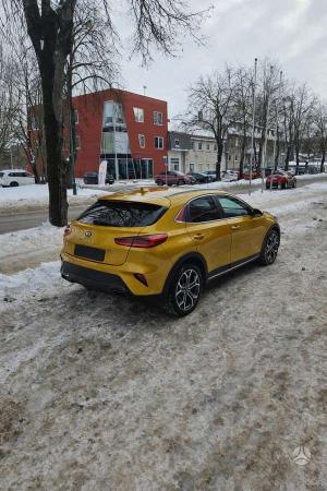 Yellow Kia XCeed 2021 in Klaipeda, with an engine capacity of 1.48 L and mileage of 86 thousand km for 18900 €, photo 3 on AUTOMOTO.COM.LV