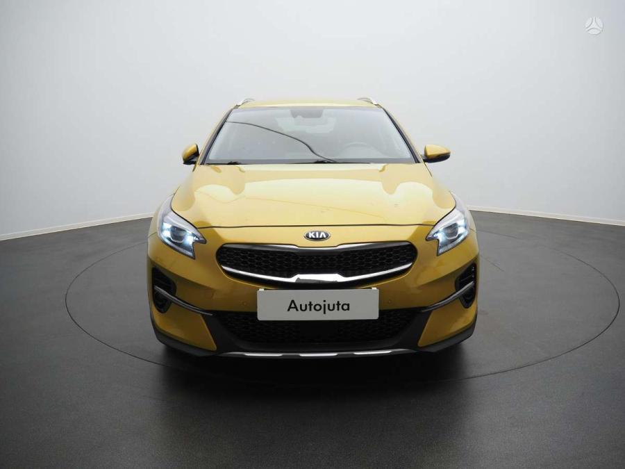Yellow Kia XCeed 2021 in Vilnius, with an engine capacity of 1.48 L and mileage of 90 thousand km for 16500 €, photo 2 on AUTOMOTO.COM.LV