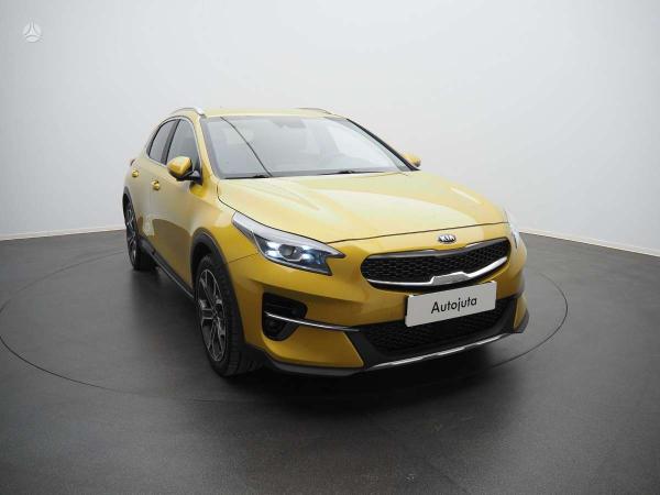 Yellow Kia XCeed 2021 in Vilnius, with an engine capacity of 1.48 L and mileage of 90 thousand km for 16500 €, photo 3 on AUTOMOTO.COM.LV