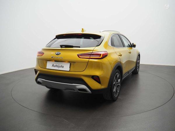 Yellow Kia XCeed 2021 in Vilnius, with an engine capacity of 1.48 L and mileage of 90 thousand km for 16500 €, photo 4 on AUTOMOTO.COM.LV