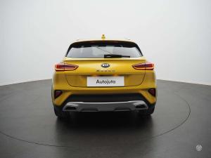 Yellow Kia XCeed 2021 in Vilnius, with an engine capacity of 1.48 L and mileage of 90 thousand km for 16500 €, photo 5 on AUTOMOTO.COM.LV