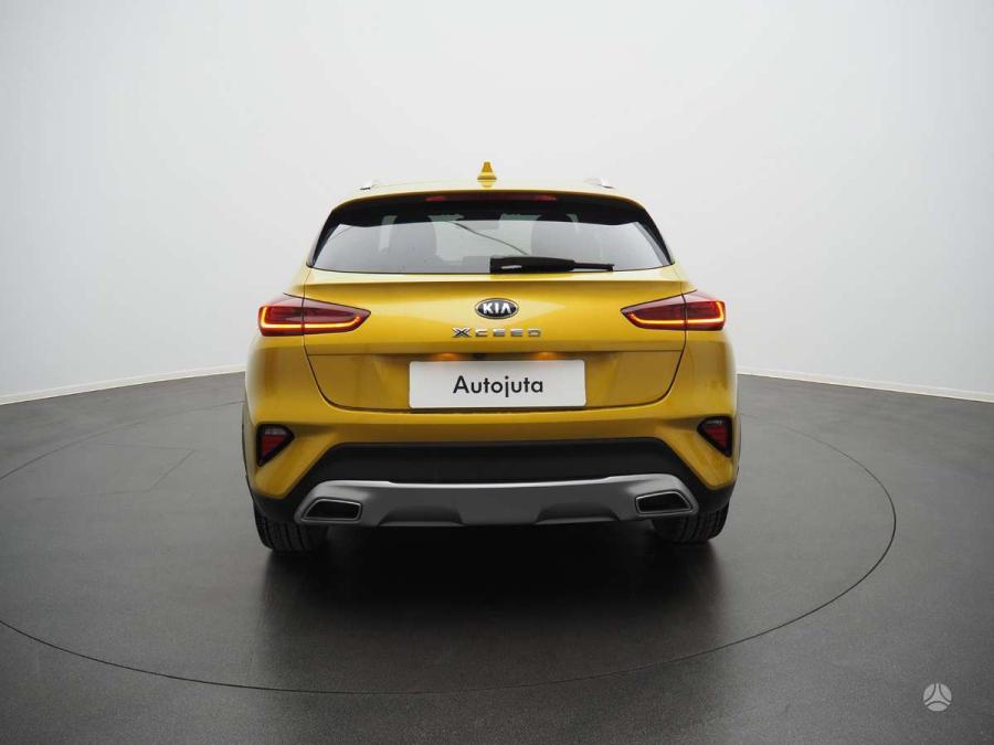Yellow Kia XCeed 2021 in Vilnius, with an engine capacity of 1.48 L and mileage of 90 thousand km for 16500 €, photo 5 on AUTOMOTO.COM.LV