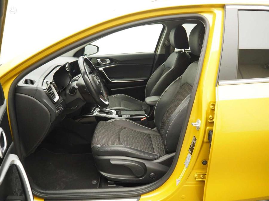 Yellow Kia XCeed 2021 in Vilnius, with an engine capacity of 1.48 L and mileage of 90 thousand km for 16500 €, photo 8 on AUTOMOTO.COM.LV