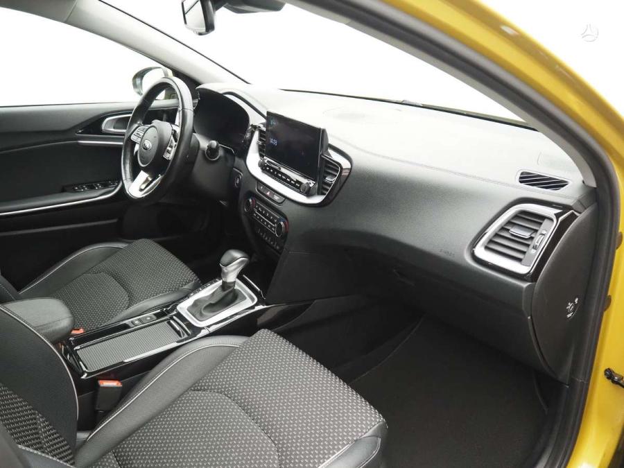 Yellow Kia XCeed 2021 in Vilnius, with an engine capacity of 1.48 L and mileage of 90 thousand km for 16500 €, photo 12 on AUTOMOTO.COM.LV
