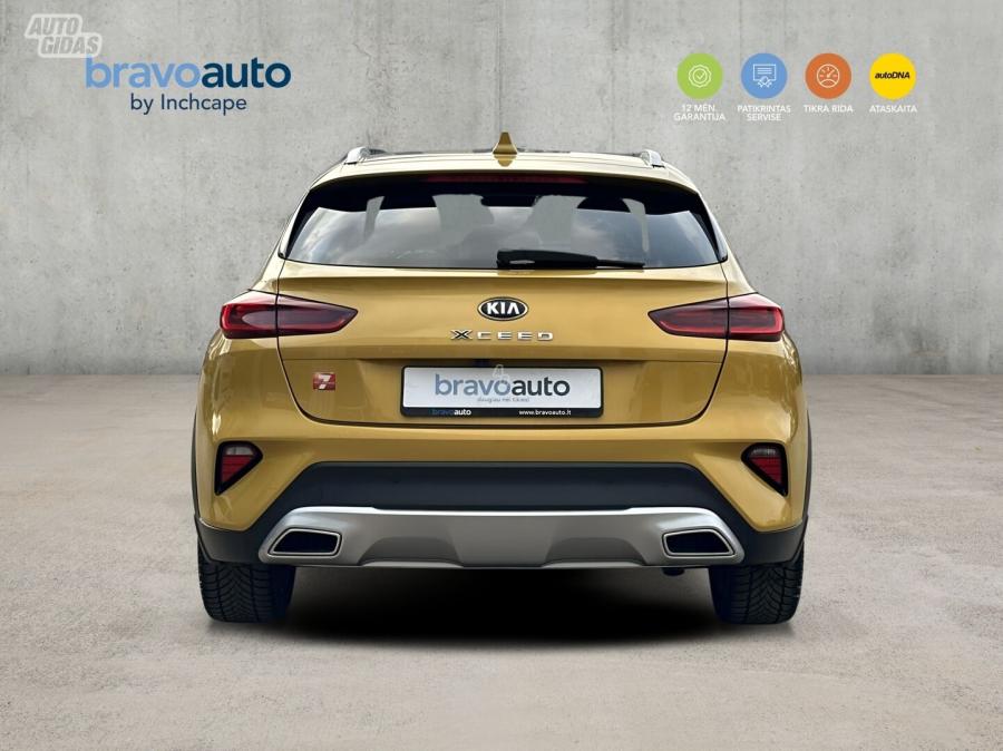 Yellow Kia XCeed 2021 in Kaunas, with an engine capacity of 1.50 L and mileage of 55 thousand km for 18771 €, photo 4 on AUTOMOTO.COM.LV