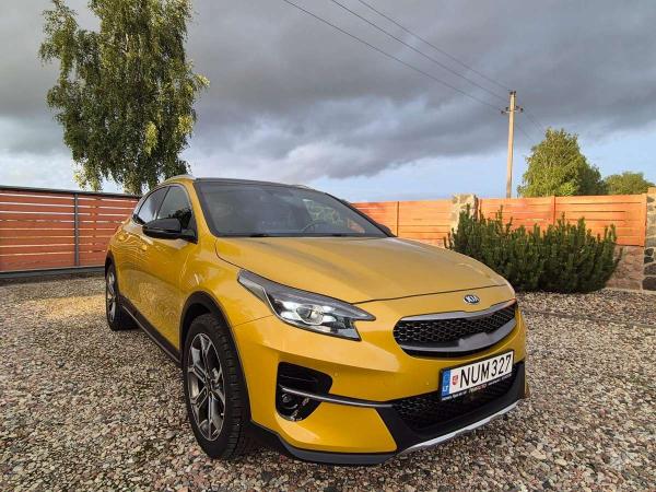 Yellow Kia XCeed 2021 in Marijampole, with an engine capacity of 1.60 L and mileage of 147 thousand km for 14400 €, photo 4 on AUTOMOTO.COM.LV