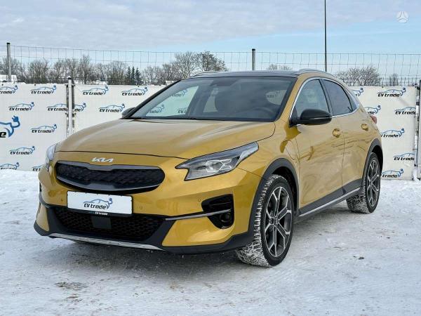 Yellow Kia XCeed 2022 in Vilnius, with an engine capacity of 1.58 L and mileage of 155 thousand km for 16999 €, photo 1 on AUTOMOTO.COM.LV