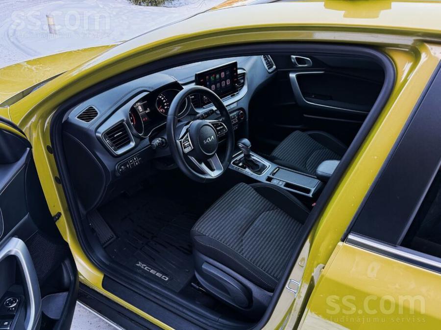 Yellow Kia XCeed 2023 in Riga, with an engine capacity of 1.50 L and mileage of 61 thousand km for 20000 €, photo 12 on AUTOMOTO.COM.LV