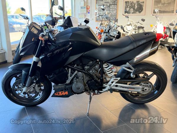 Melns KTM 990 Super Duke 2005 Tallina, ar dzinēja tilpumu 1.00 L un nobraukumu 38 tūkst. km par 3490 €, foto 11 vietnē AUTOMOTO.COM.LV