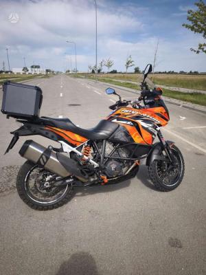 Oranžs KTM Adventure 2015 Marijampole, ar dzinēja tilpumu 1.05 L un nobraukumu 83 tūkst. km par 6000 €, foto  vietnē AUTOMOTO.COM.LV