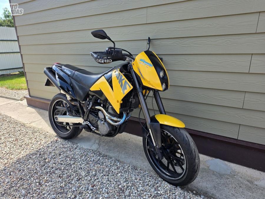 Melns KTM Duke 2004 Pasvalys, ar dzinēja tilpumu 0.64 L un nobraukumu 30 tūkst. km par 1299 €, foto 13 vietnē AUTOMOTO.COM.LV