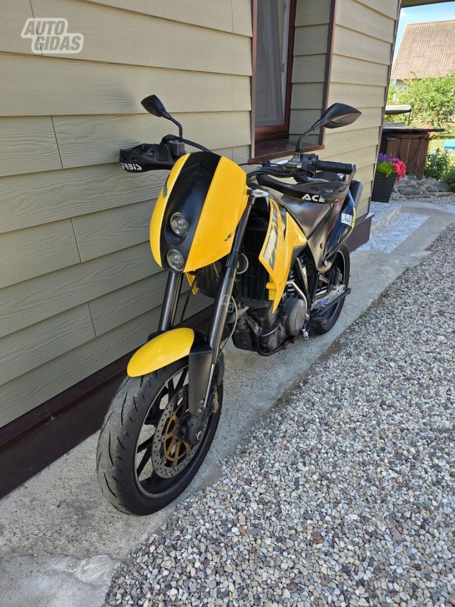 Melns KTM Duke 2004 Pasvalys, ar dzinēja tilpumu 0.64 L un nobraukumu 30 tūkst. km par 1299 €, foto 18 vietnē AUTOMOTO.COM.LV