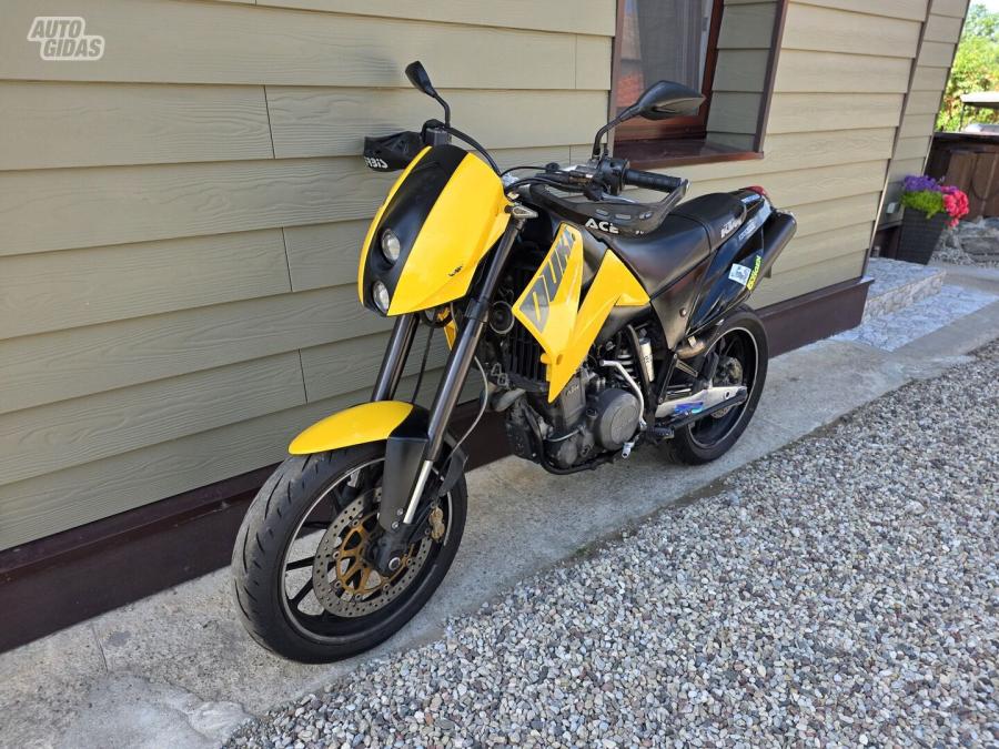 Melns KTM Duke 2004 Pasvalys, ar dzinēja tilpumu 0.64 L un nobraukumu 30 tūkst. km par 1299 €, foto 19 vietnē AUTOMOTO.COM.LV