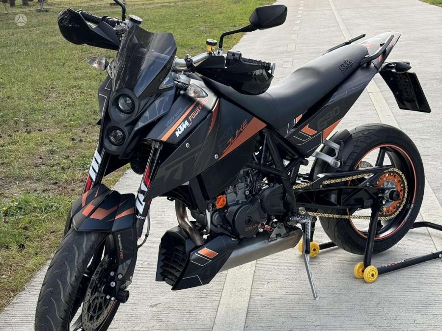 Melns KTM Duke 2010 Kauņa, ar dzinēja tilpumu 0.65 L un nobraukumu 6 tūkst. km par 6500 €, foto 15 vietnē AUTOMOTO.COM.LV