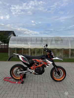 Oranžs KTM SMC 2014 Klaipėda, ar dzinēja tilpumu 0.69 L un nobraukumu 19 tūkst. km par 5999 €, foto  vietnē AUTOMOTO.COM.LV
