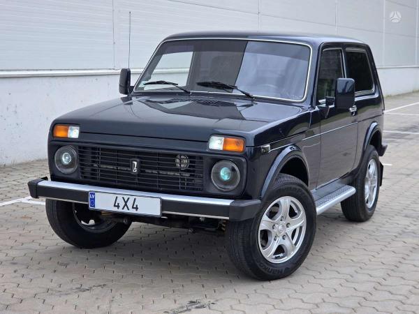 Green Lada Niva 1999 in Riga, with an engine capacity of 1.70 L and mileage of 100 thousand km for 11990 €, photo 2 on AUTOMOTO.COM.LV