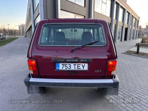 Sarkans Lada Niva 2005 Tallina, ar dzinēja tilpumu 1.70 L un nobraukumu 60 tūkst. km par 3599 €, foto 11 vietnē AUTOMOTO.COM.LV