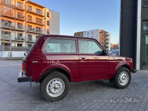 Sarkans Lada Niva 2005 Tallina, ar dzinēja tilpumu 1.70 L un nobraukumu 60 tūkst. km par 3599 €, foto 13 vietnē AUTOMOTO.COM.LV