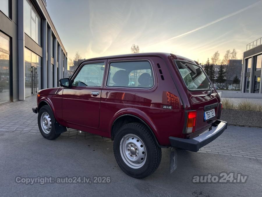 Sarkans Lada Niva 2005 Tallina, ar dzinēja tilpumu 1.70 L un nobraukumu 60 tūkst. km par 3599 €, foto 14 vietnē AUTOMOTO.COM.LV