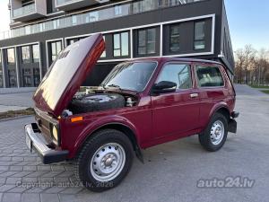 Sarkans Lada Niva 2005 Tallina, ar dzinēja tilpumu 1.70 L un nobraukumu 60 tūkst. km par 3599 €, foto 17 vietnē AUTOMOTO.COM.LV